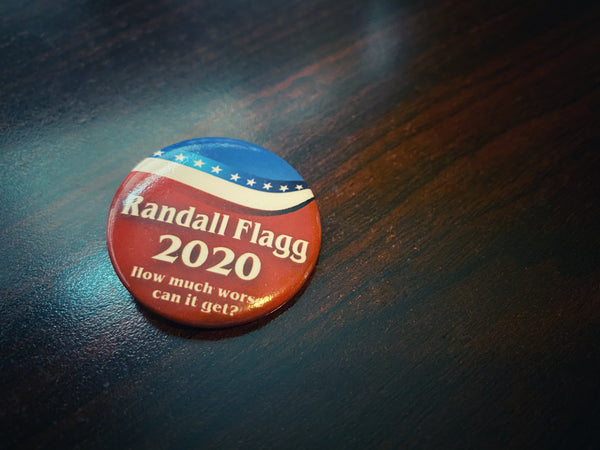 19th Edition: Randall Flagg 2020 1.5" Button – LightBox & 19th Edition